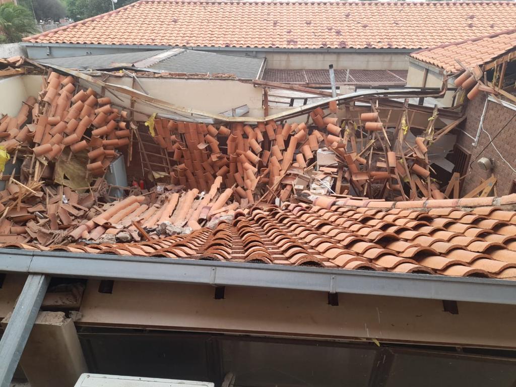 Roof literally collapsing on court infrastructure